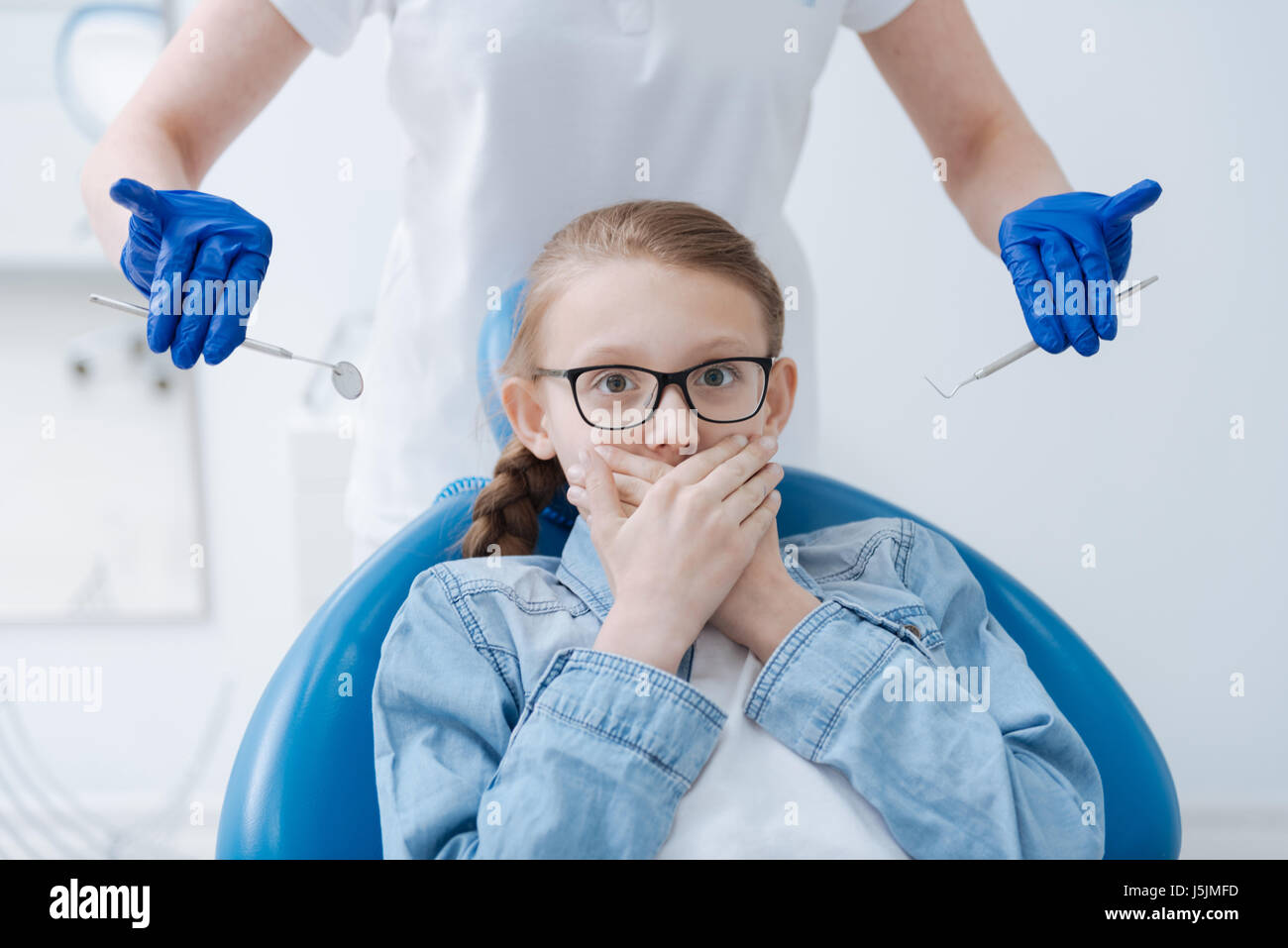 Scared teenage girl having anxiety Stock Photo - Alamy
