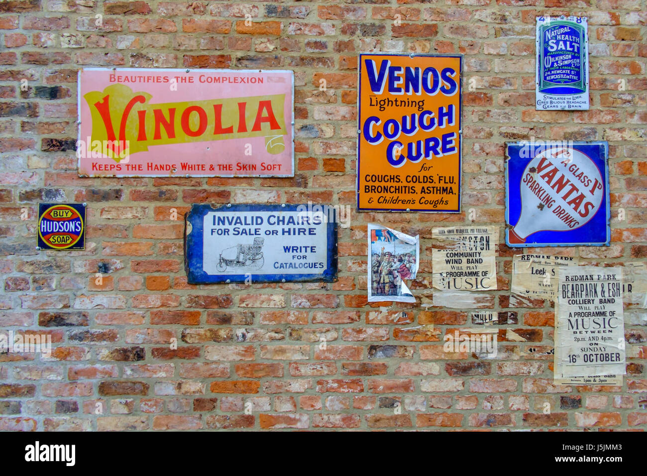 Old fashioned enamel advertising signs displayed at Beamish, which is a ...