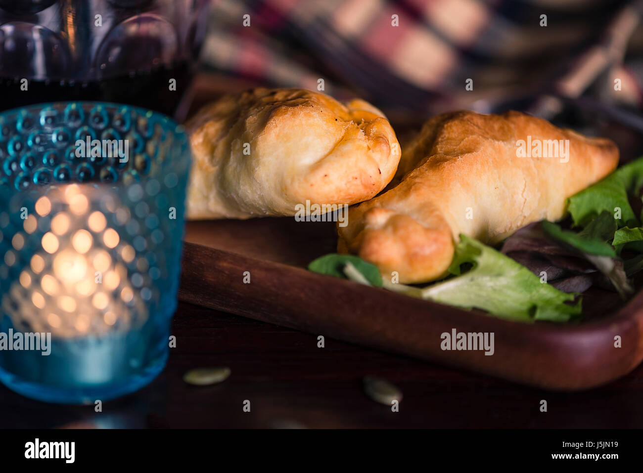 Style from Patagonia: Two empanadas and a glass of wine in a chic ...