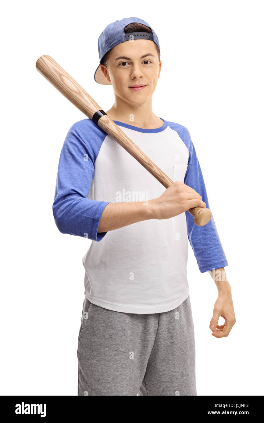 Teen baseball player with a bat looking at the camera isolated on white ...