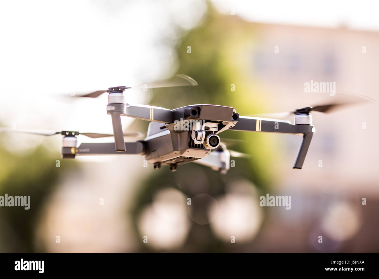 drone quad copter with high resolution digital camera flying hovering ...