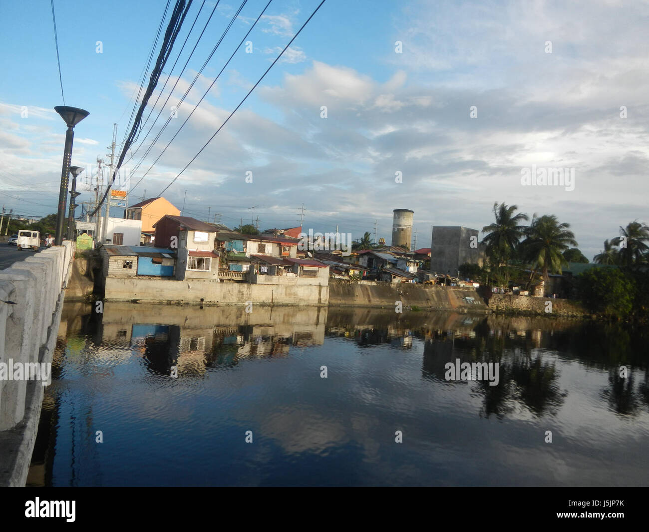 The Bocaue River Bridge in Bulacan, Philippines, provides a scenic view ...