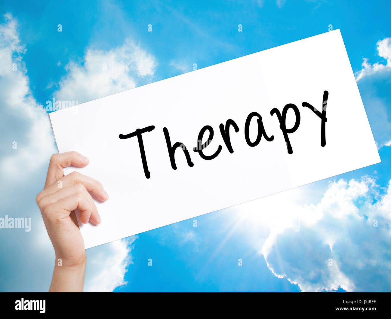 Therapy Sign on white paper. Man Hand Holding Paper with text. Isolated ...
