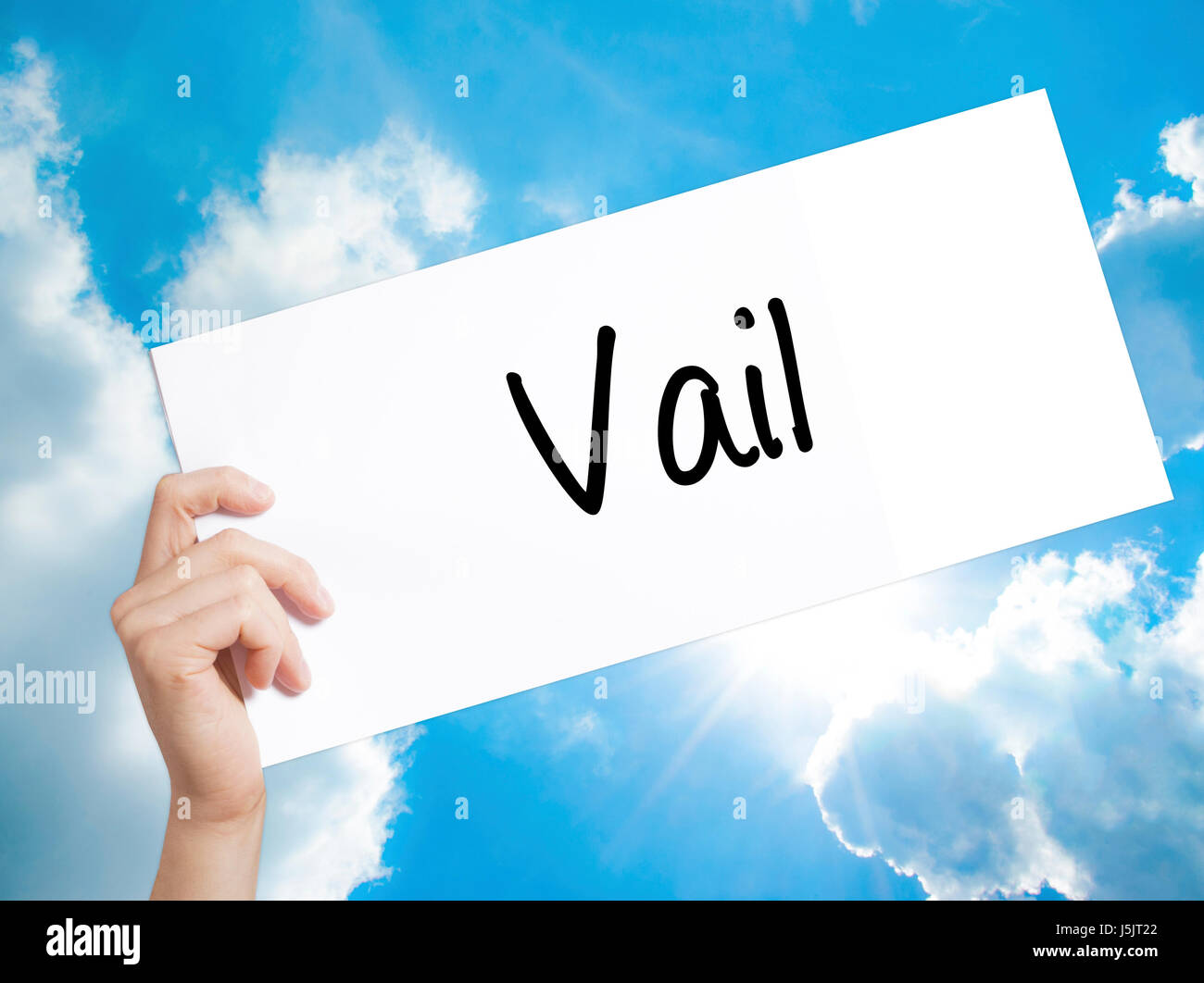 Vail Sign on white paper. Man Hand Holding Paper with text. Isolated on ...