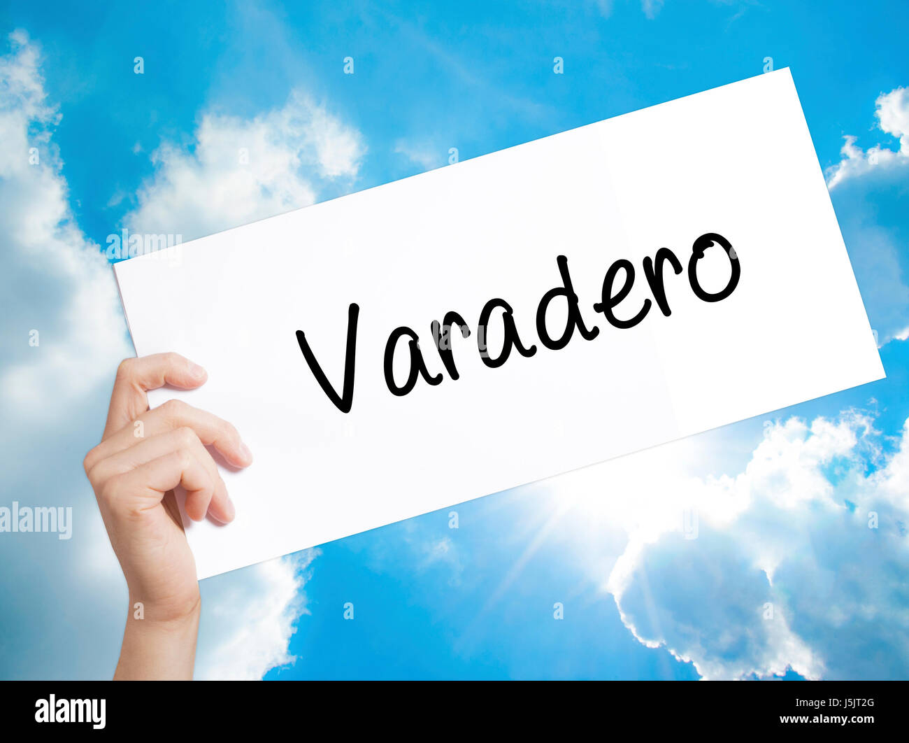 Varadero Sign on white paper. Man Hand Holding Paper with text ...