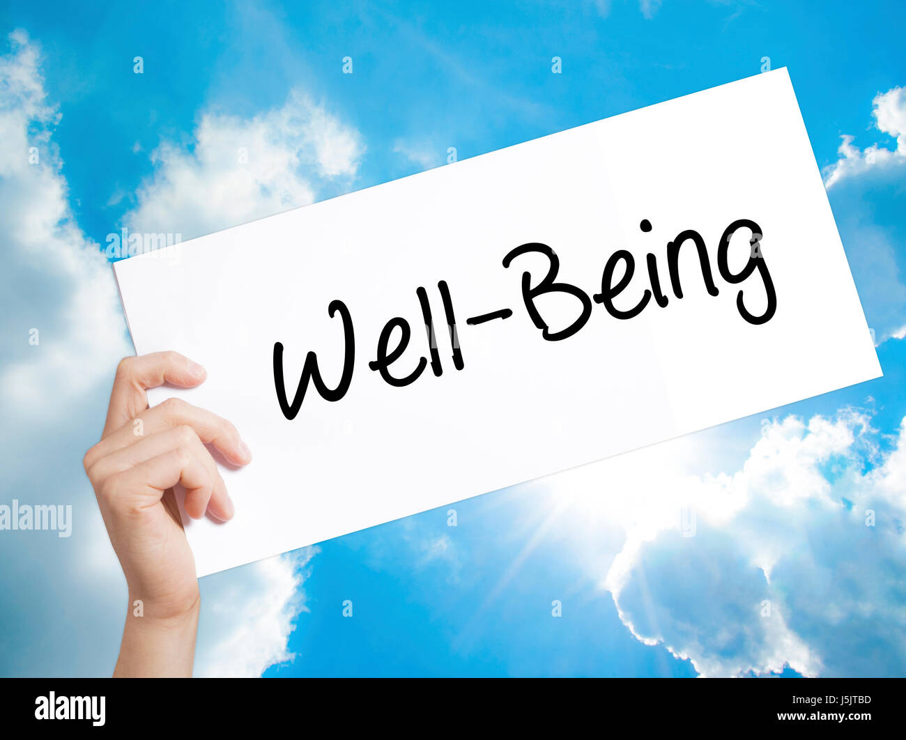 Well-Being Sign on white paper. Man Hand Holding Paper with text ...