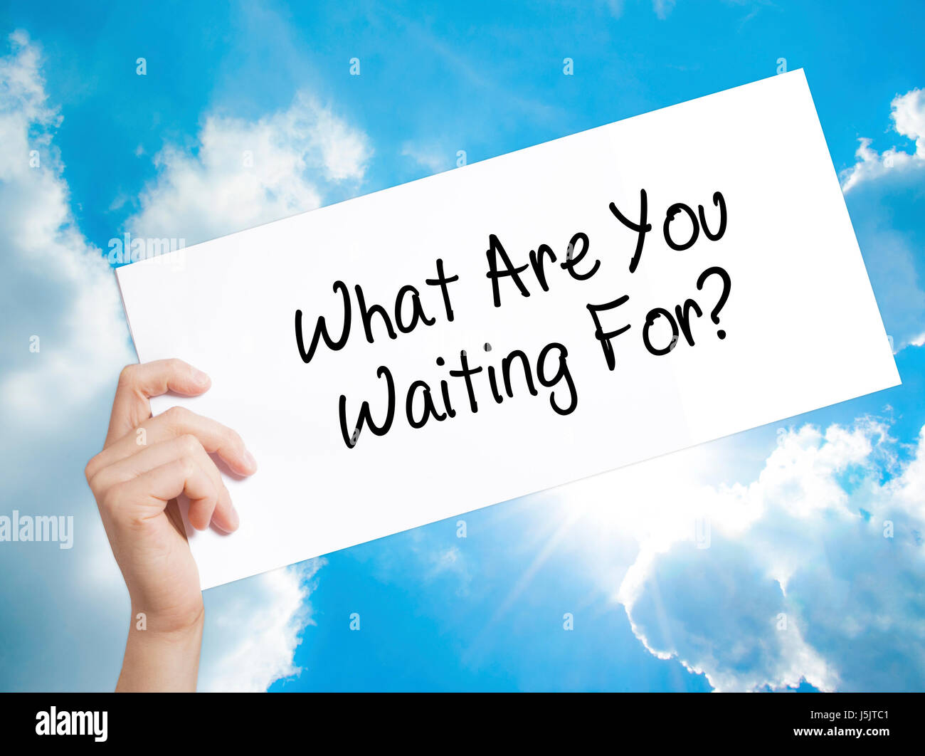 What Are You Waiting For? Sign on white paper. Man Hand Holding Paper ...