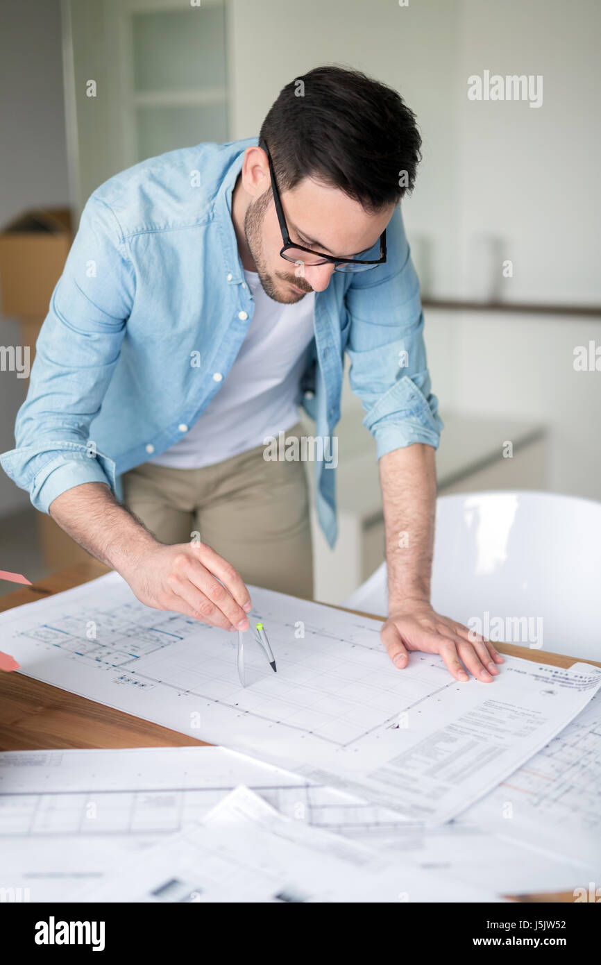 Architect desk plans building hi-res stock photography and images - Alamy