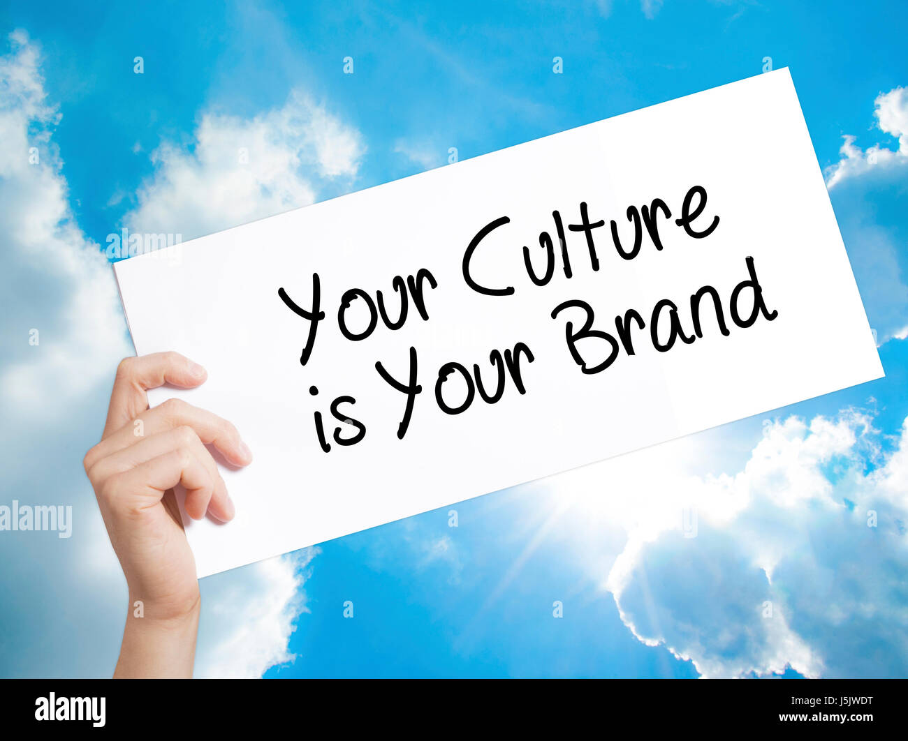 Your Culture is Your Brand Sign on white paper. Man Hand Holding Paper ...
