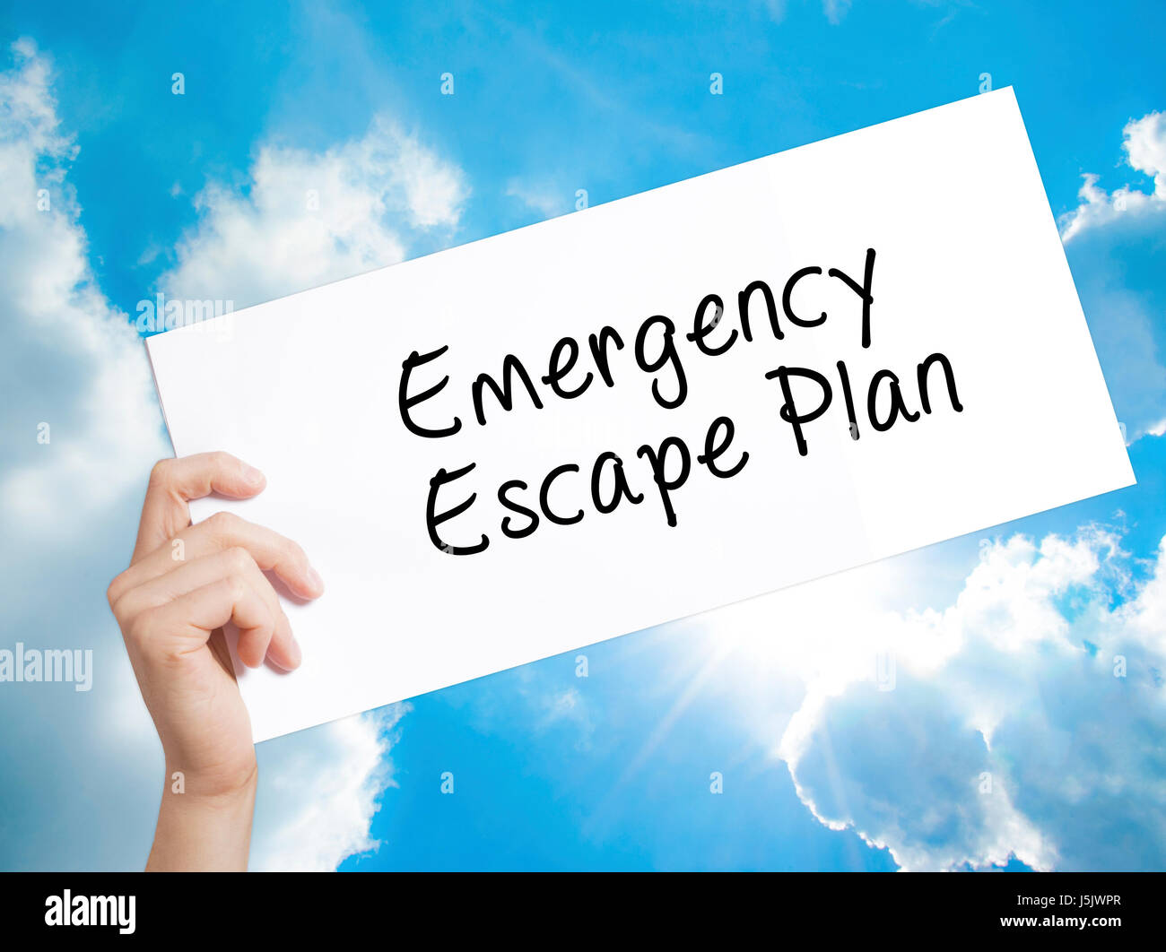 Emergency Escape Plan Sign on white paper. Man Hand Holding Paper with ...