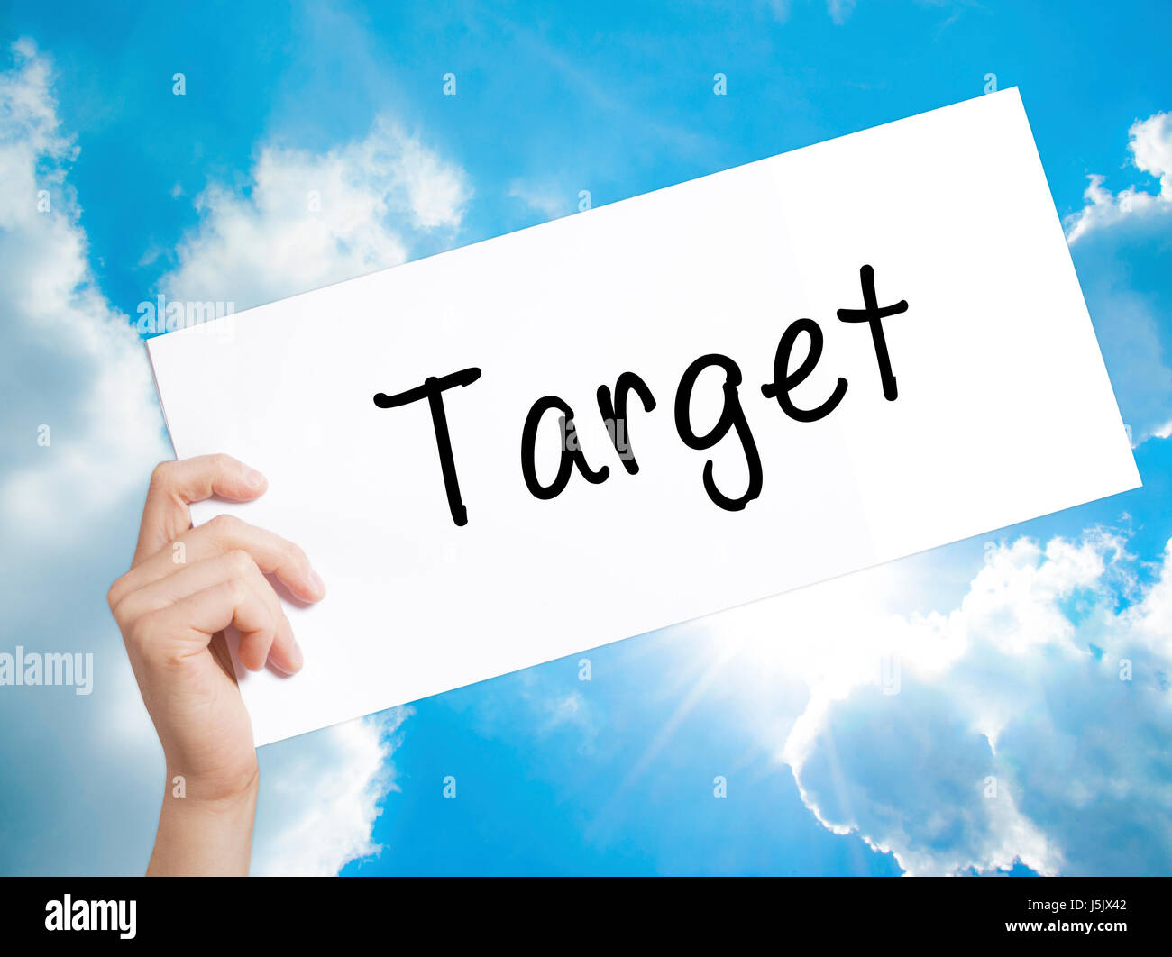 Target Sign on white paper. Man Hand Holding Paper with text. Isolated ...