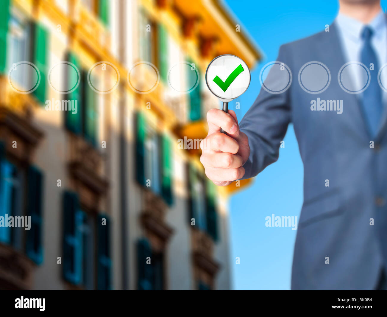 Businessman magnifying glass check mark on virtual screen. Magnifying ...