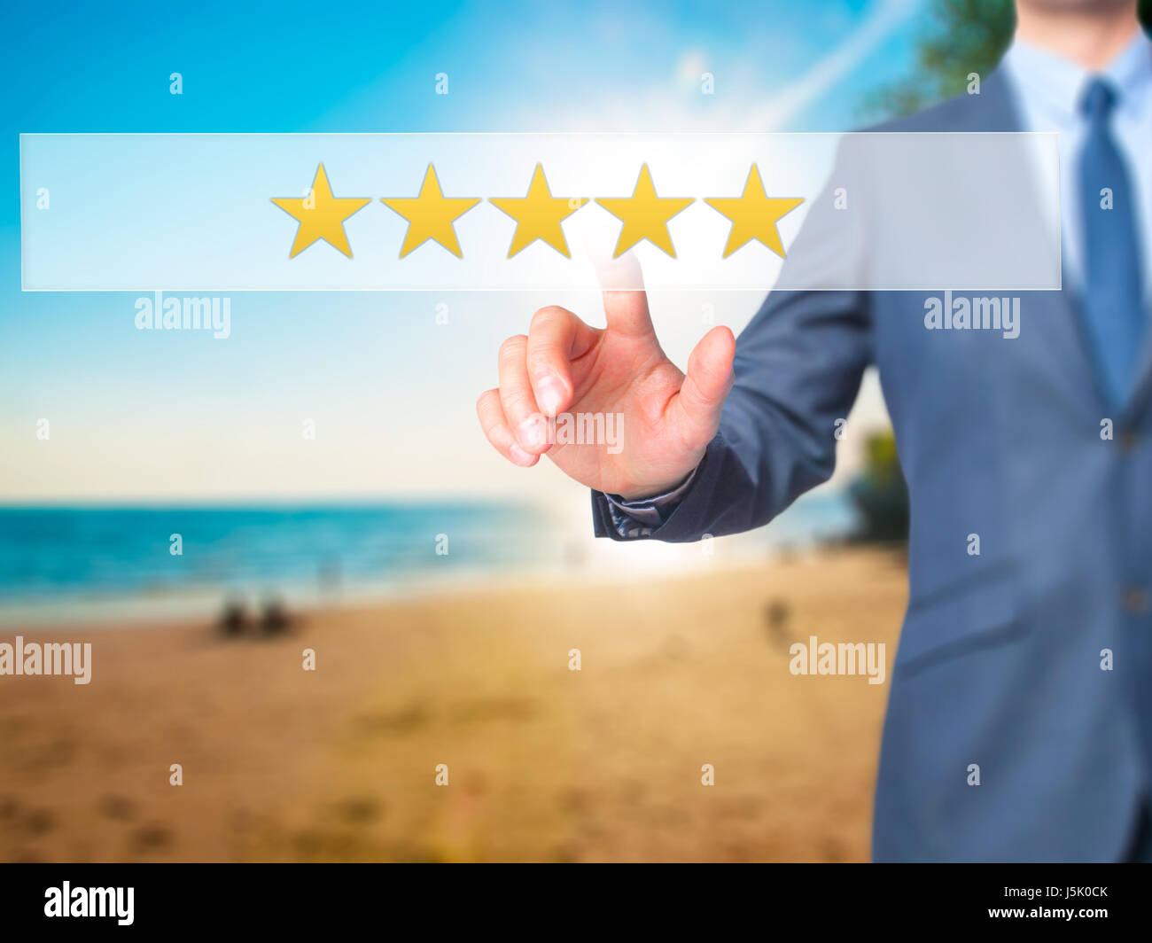 Five star rating - Businessman hand pressing button on touch screen ...