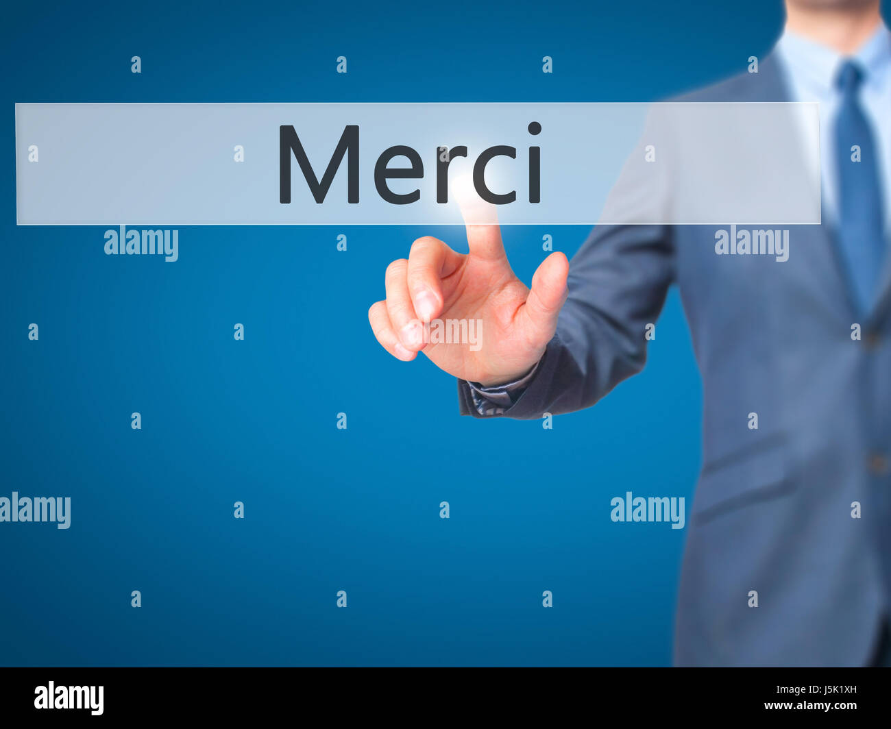Merci - Businessman hand pressing button on touch screen interface ...