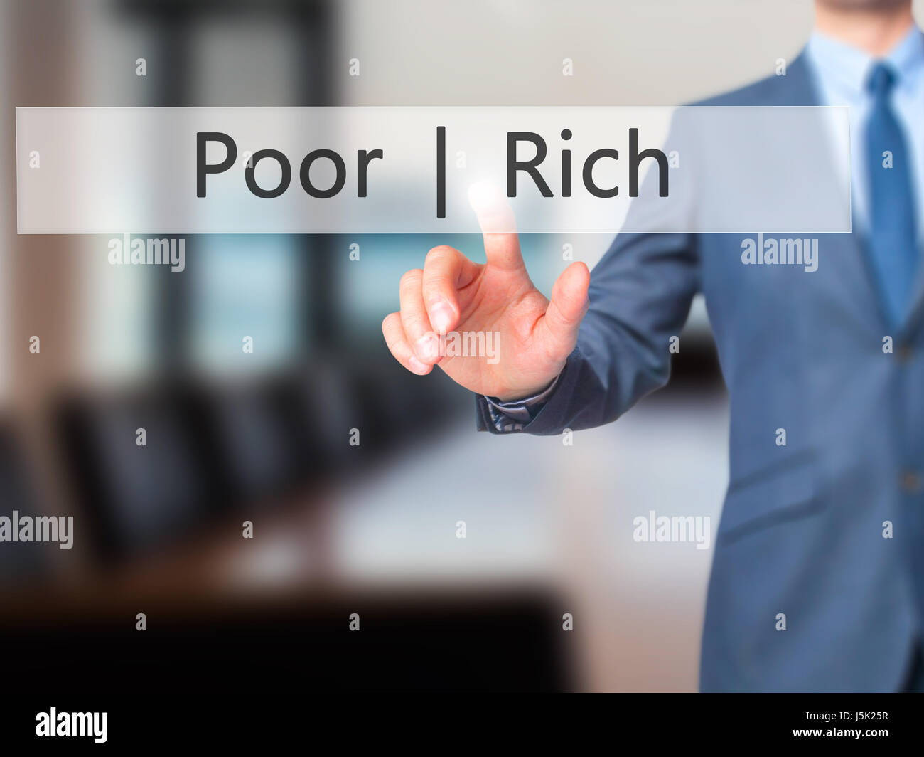 Poor Rich - Businessman hand pressing button on touch screen interface ...