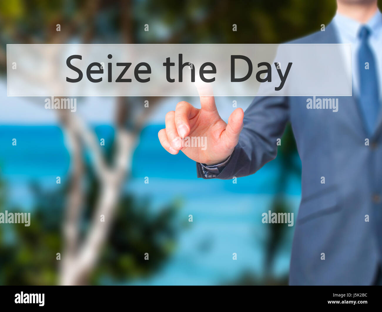 Seize the Day - Businessman hand pressing button on touch screen ...