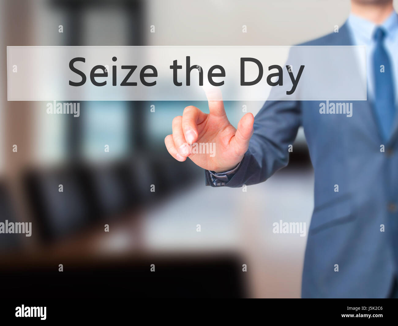 Seize the Day - Businessman hand pressing button on touch screen ...