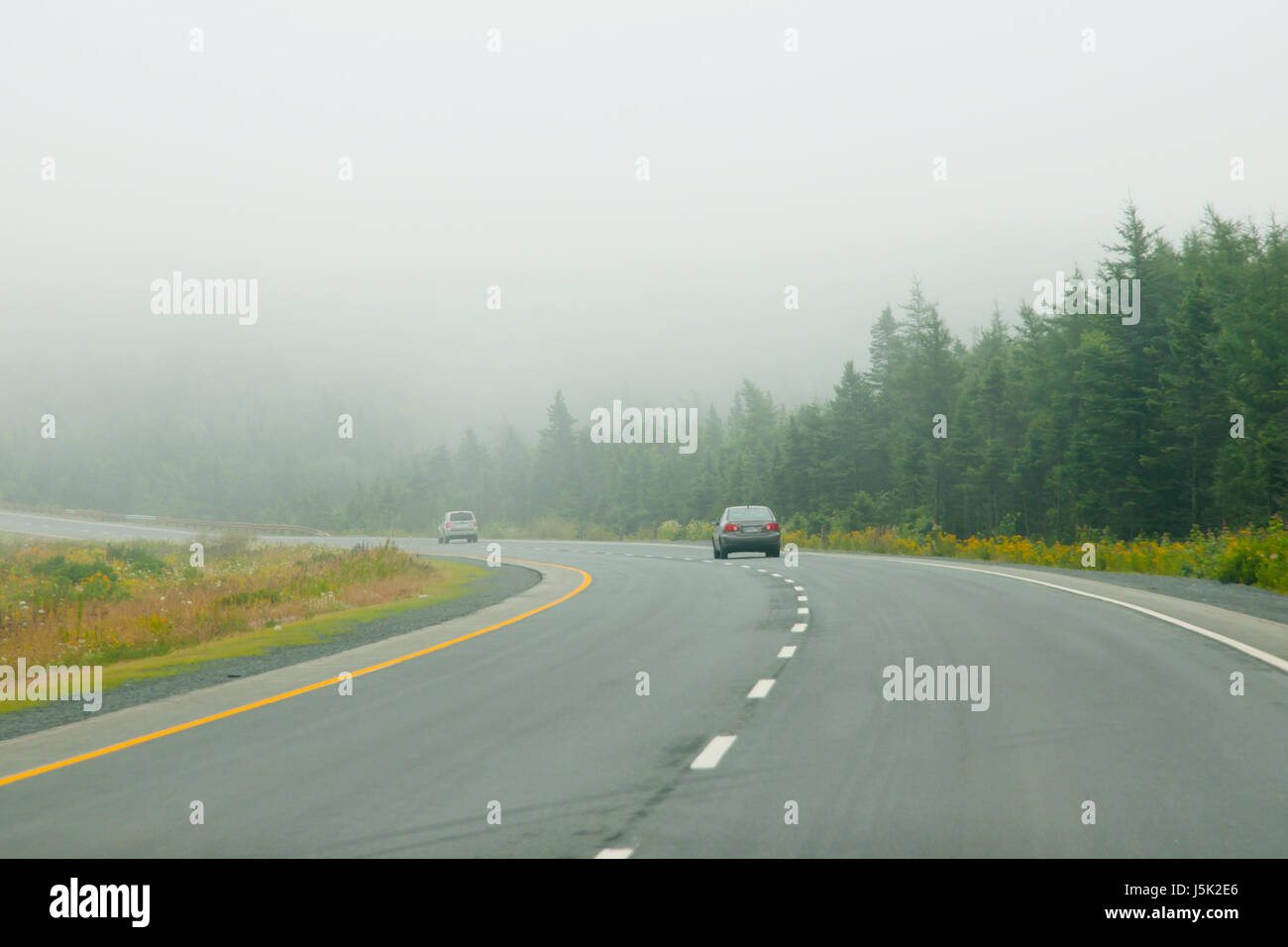 Foggy highway hi-res stock photography and images - Alamy