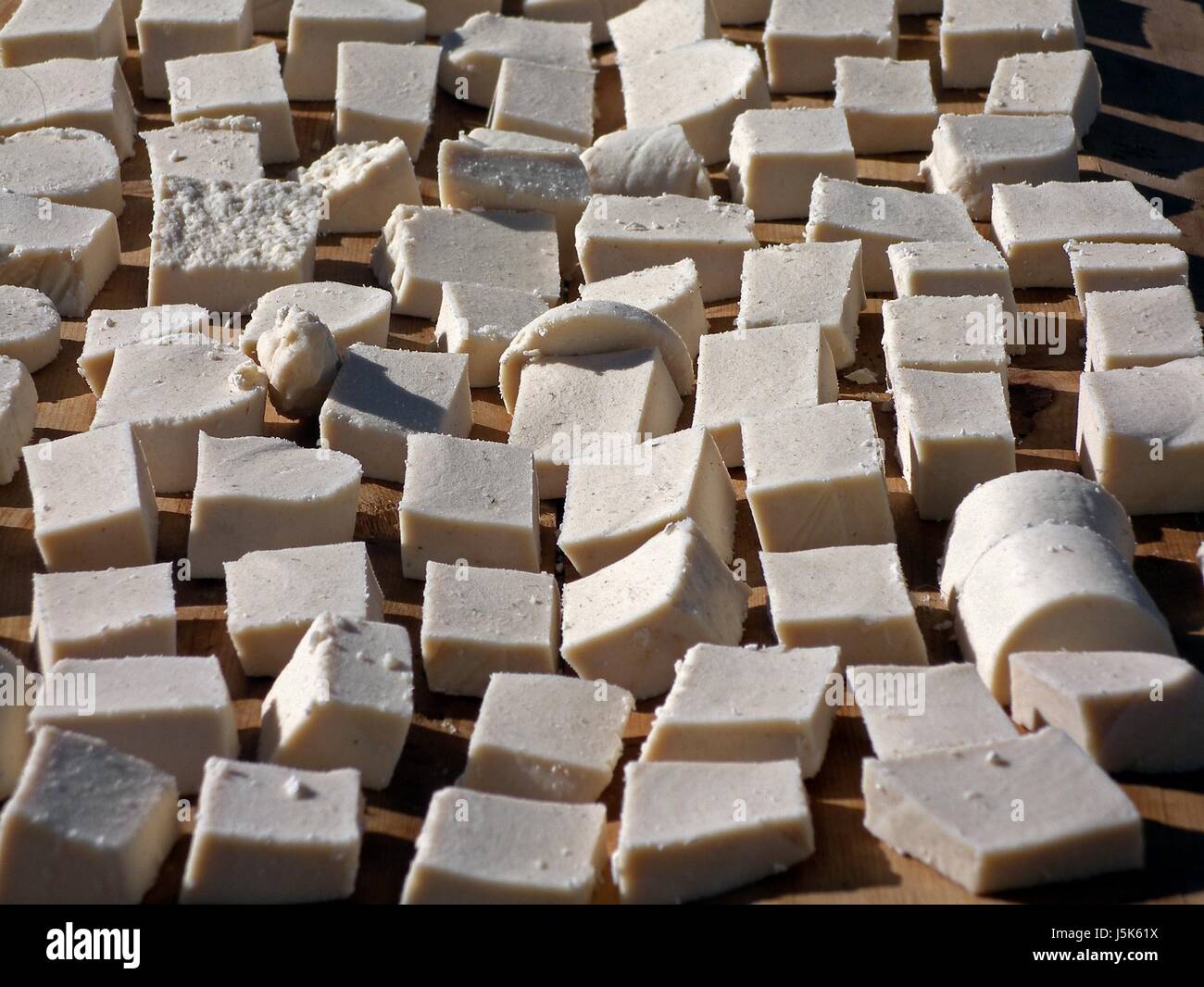 hard adamant dry cheese wooden board air-seasoned curd curds milk ...