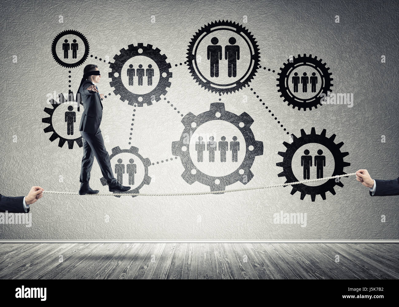 Business concept of risk support and assistance with man balancing on ...