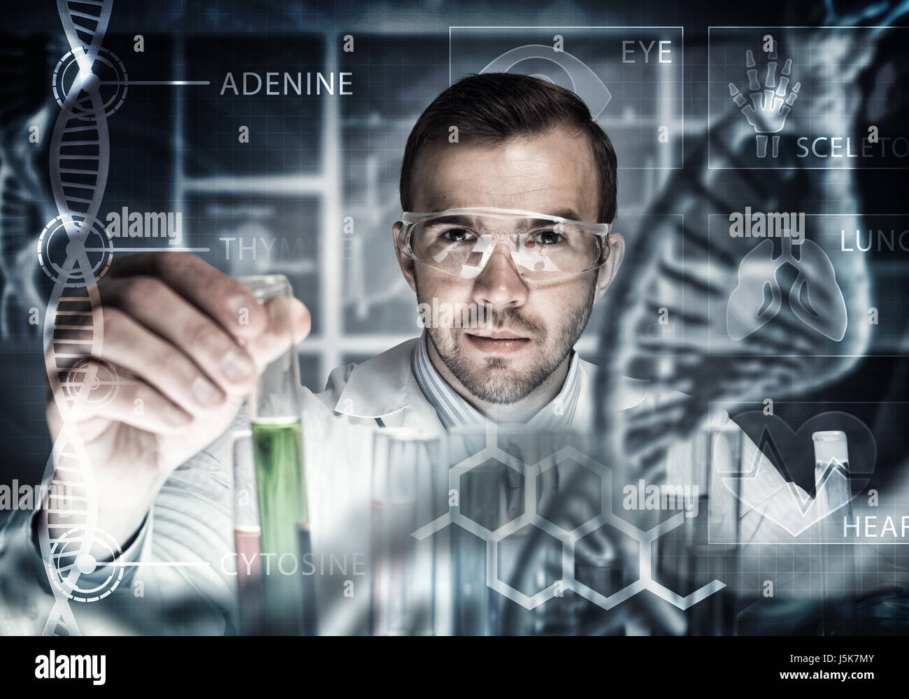 Young scientist mixing reagents in glass flask in clinical laboratory ...