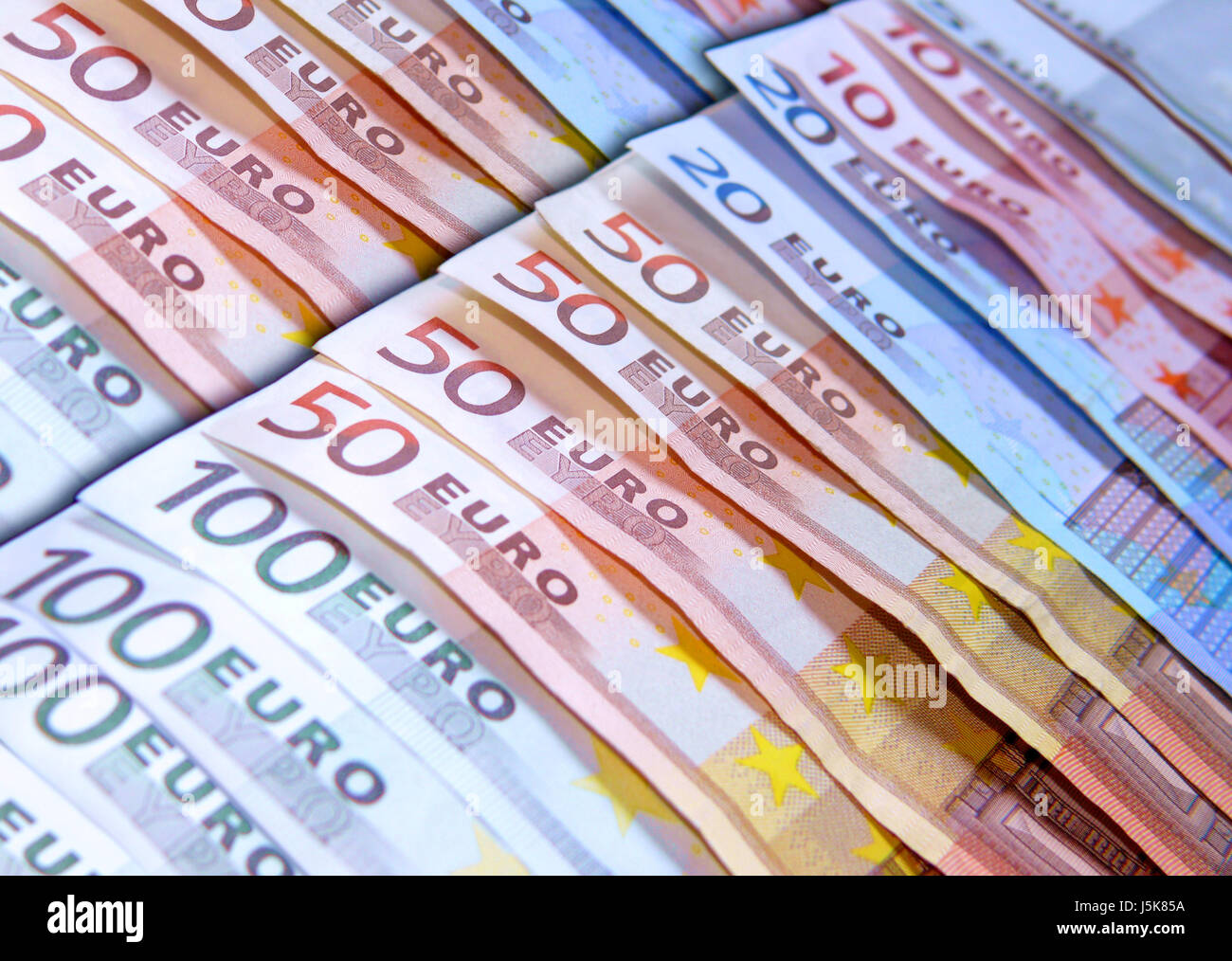 many colorful bills Stock Photo - Alamy