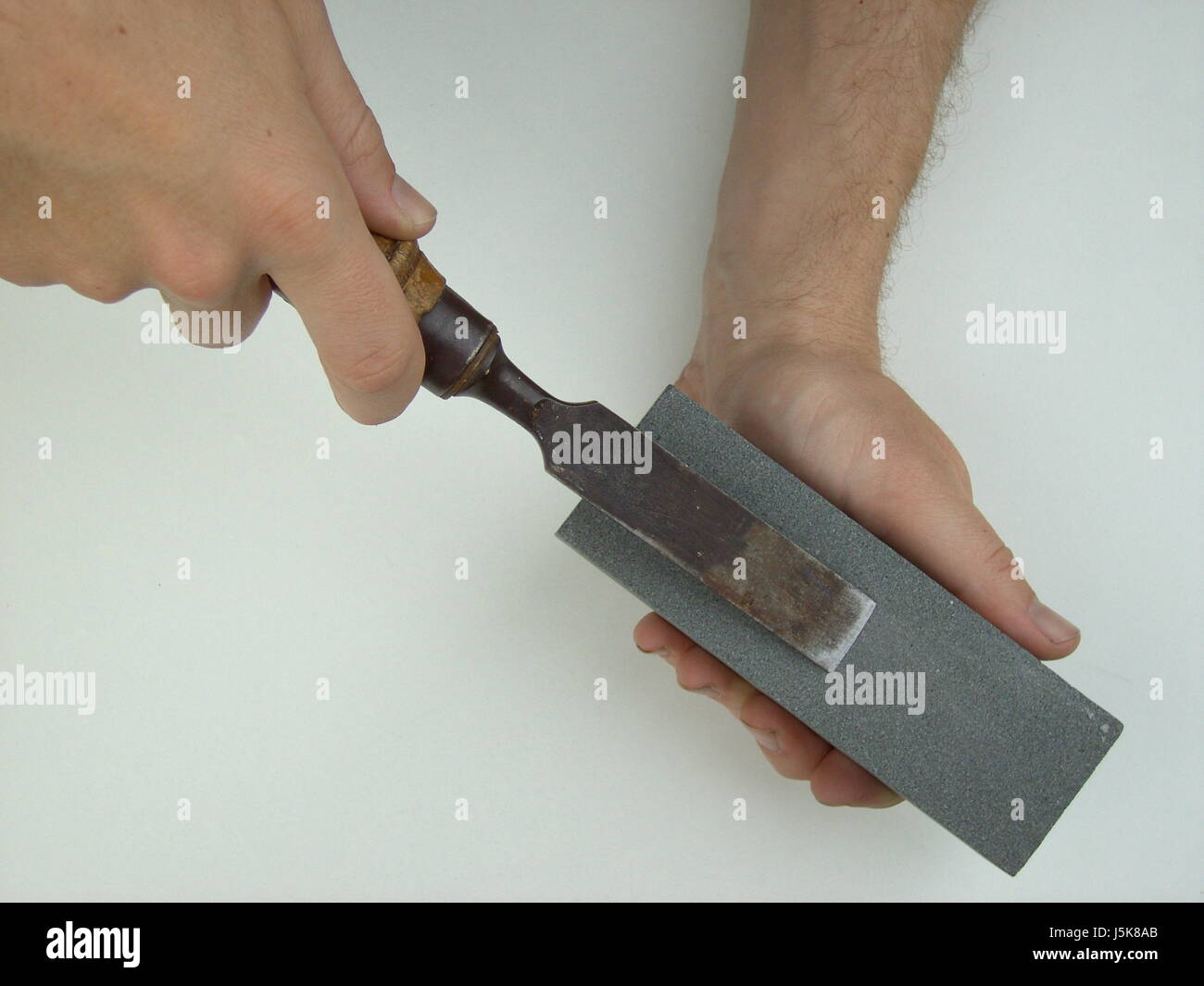 chisels sharpen 02 Stock Photo - Alamy