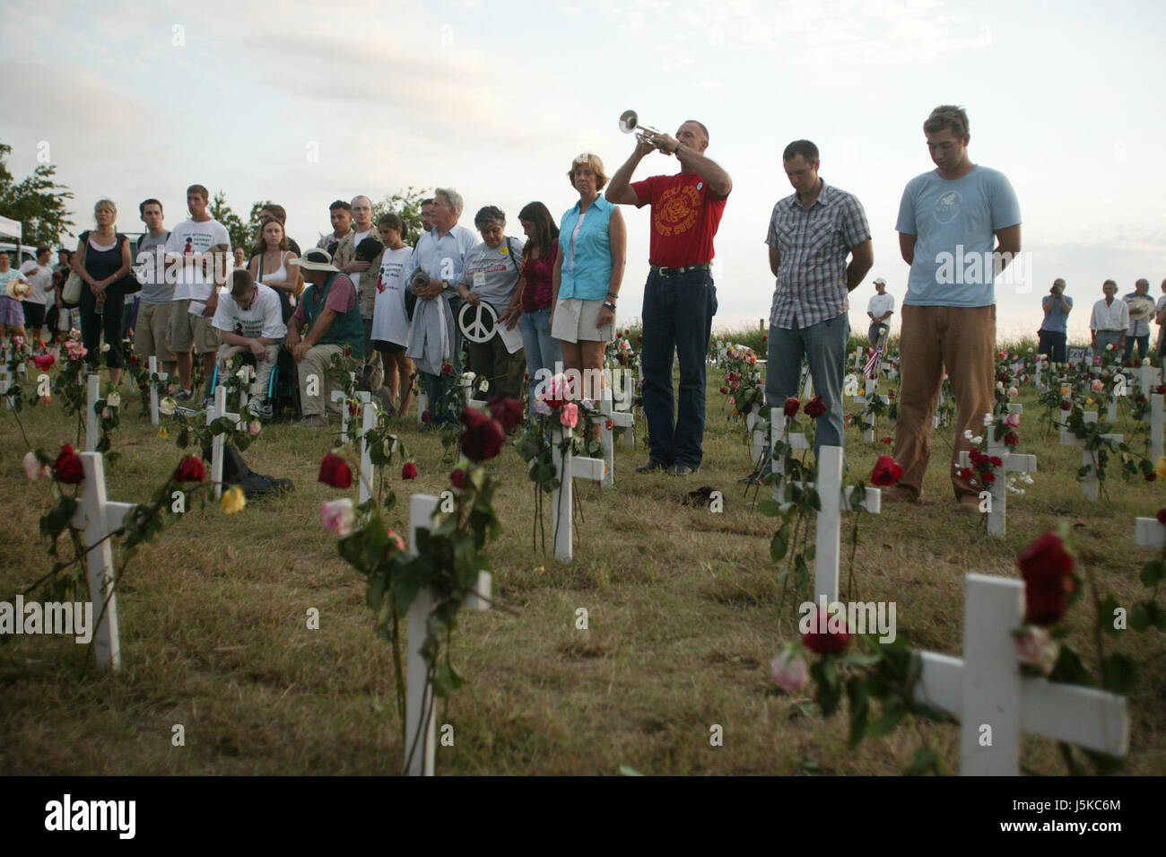 Jeff Key plays taps for U.S. soldiers who have died during the war in ...