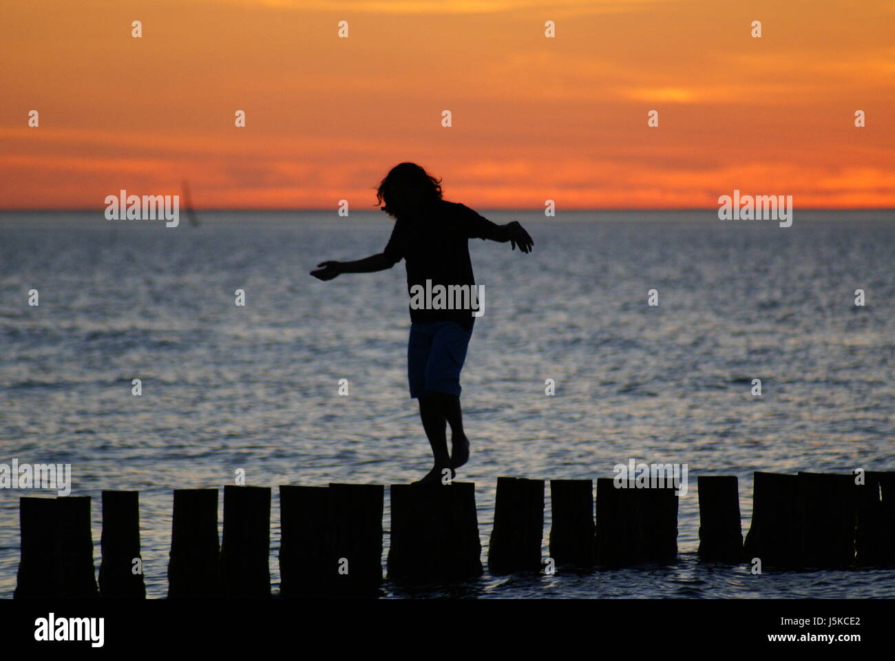 sunset human human being water baltic sea salt water sea ocean balance ...