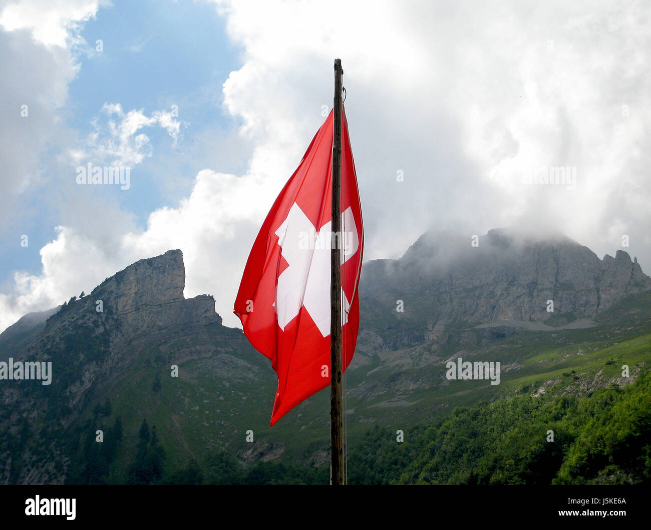 culture mountains alps alp cross switzerland flag cloudy mast ...