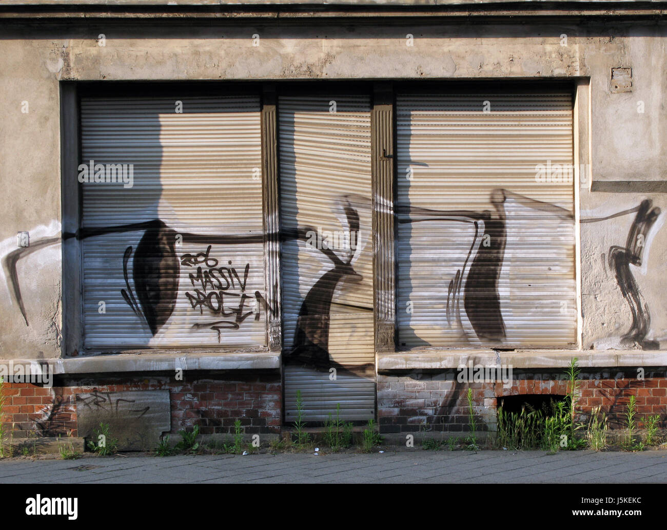 closed shop window daub graffiti grafitti bankrupt forsaken alone ...