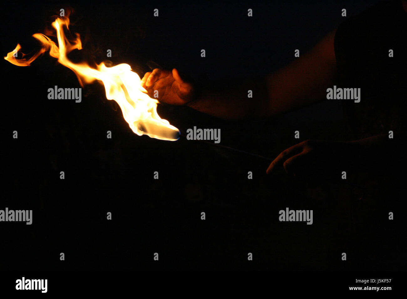 hand in the fire Stock Photo - Alamy