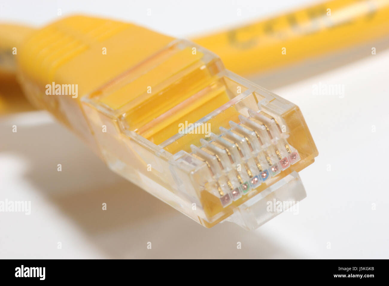 yellow network cable Stock Photo - Alamy