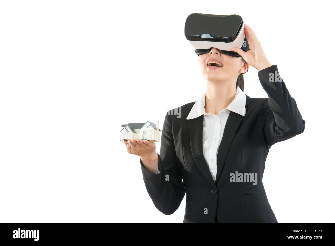 asian building engineering designer wearing VR virtual reality device ...