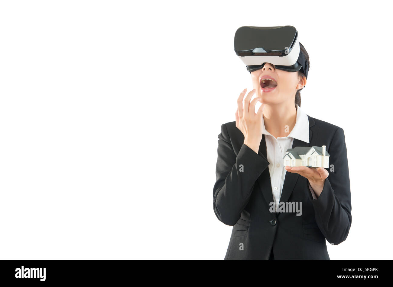 Unhappy woman holding vr headset hi-res stock photography and images ...