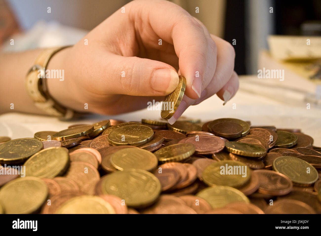 take a coin Stock Photo - Alamy
