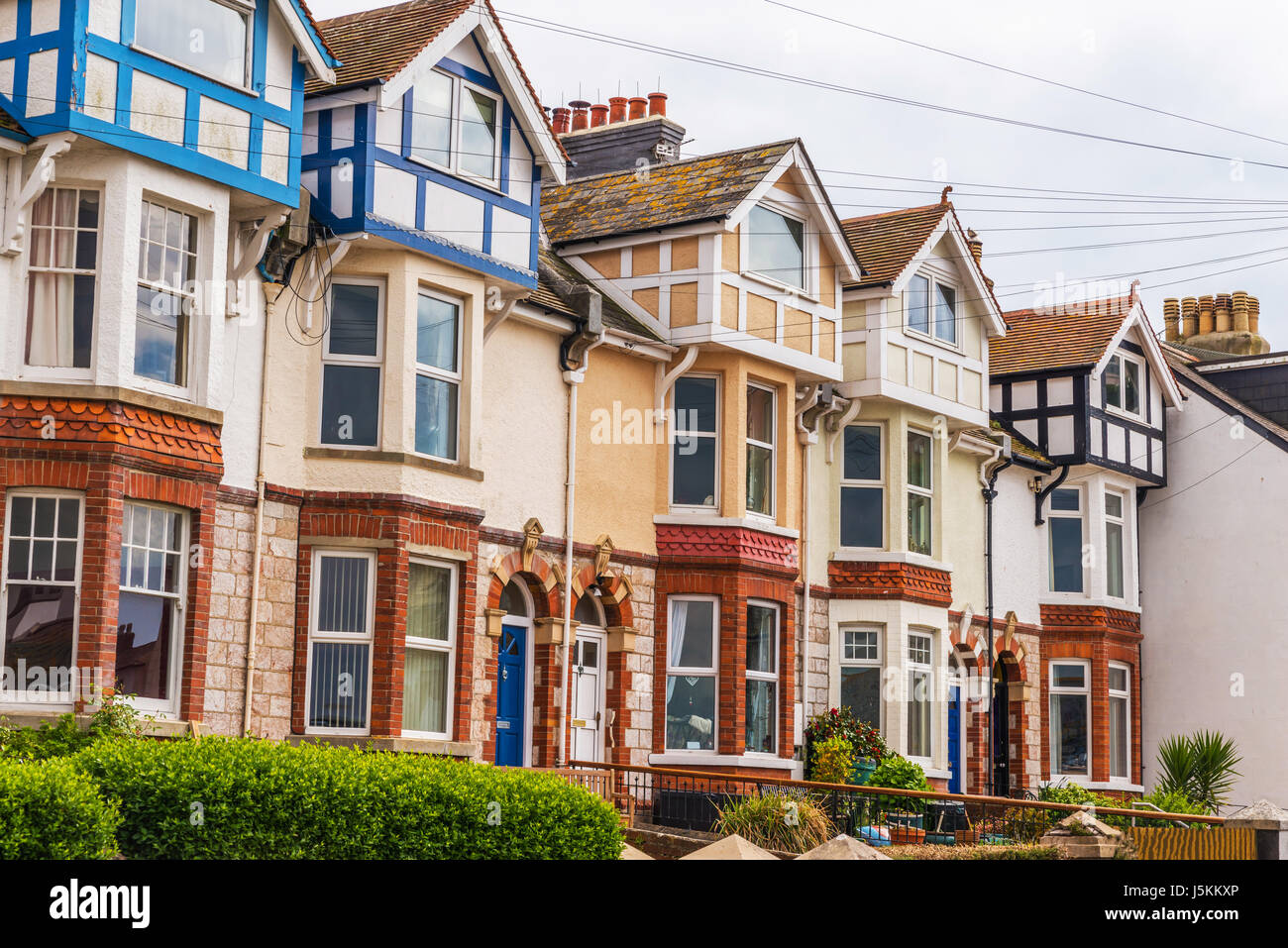 Typical English architecture, residential buildings in a row along the ...