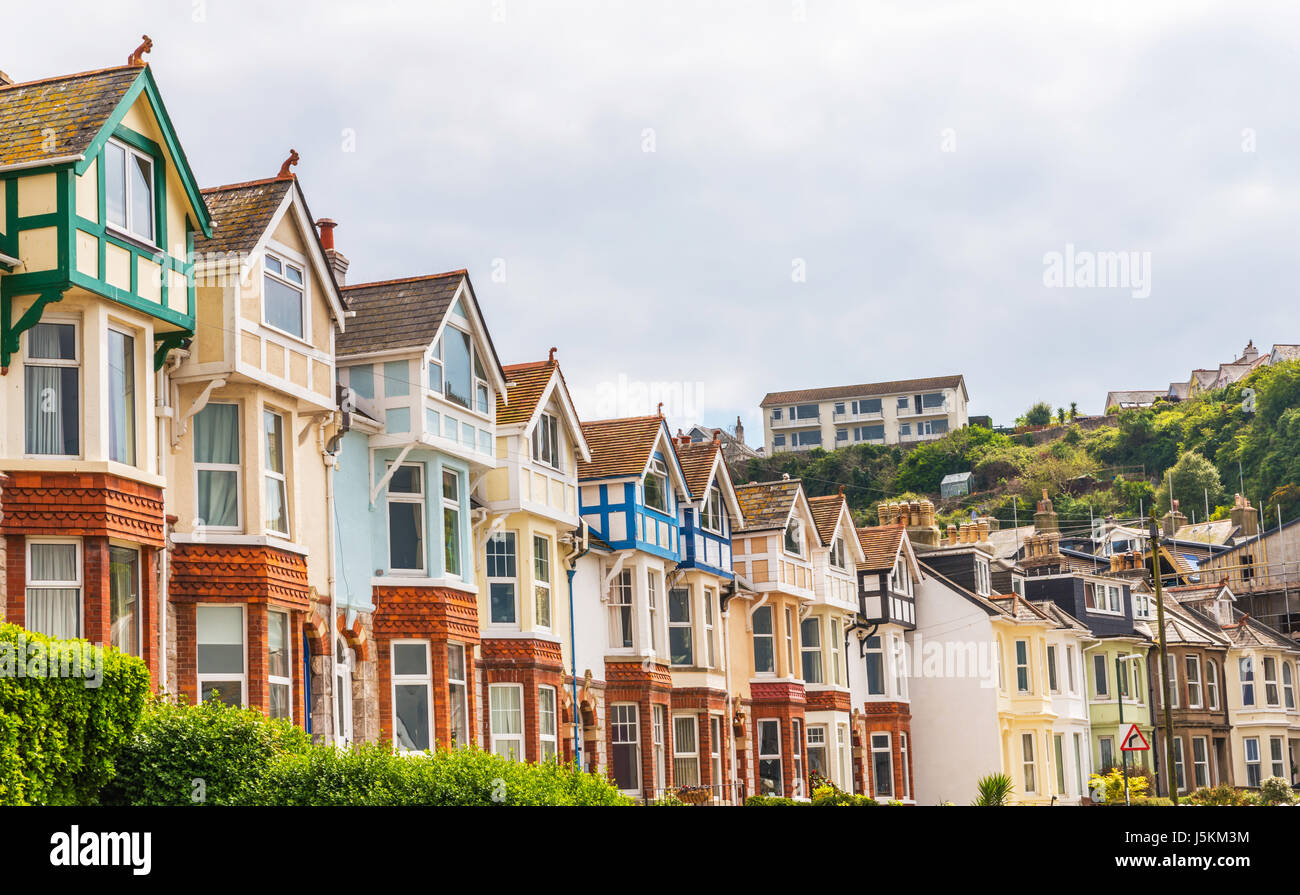 Typical English architecture, residential buildings in a row along the ...