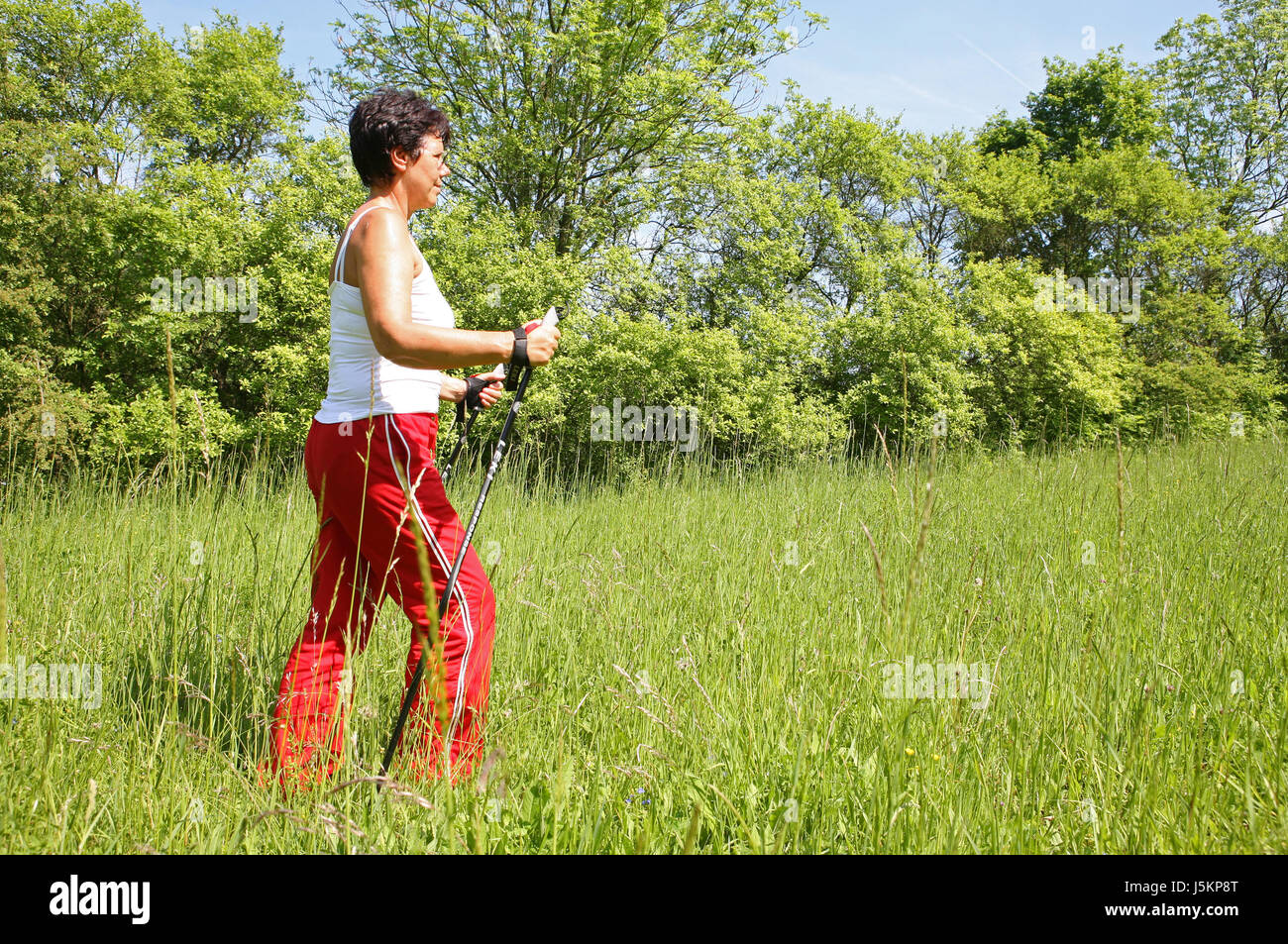woman motion postponement moving movement stride walk go going walking ...