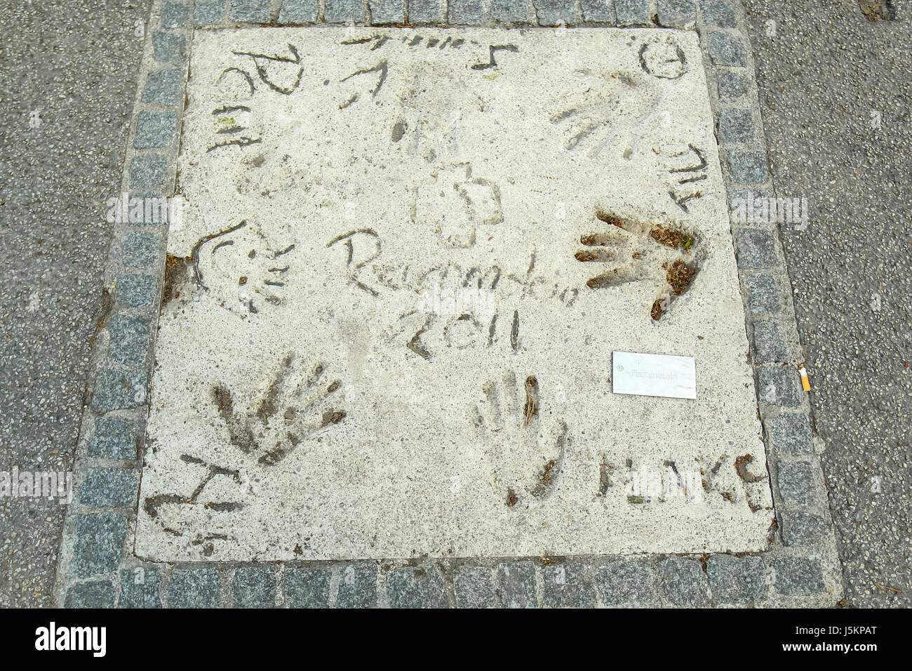 Hand print in concrete hi-res stock photography and images - Alamy