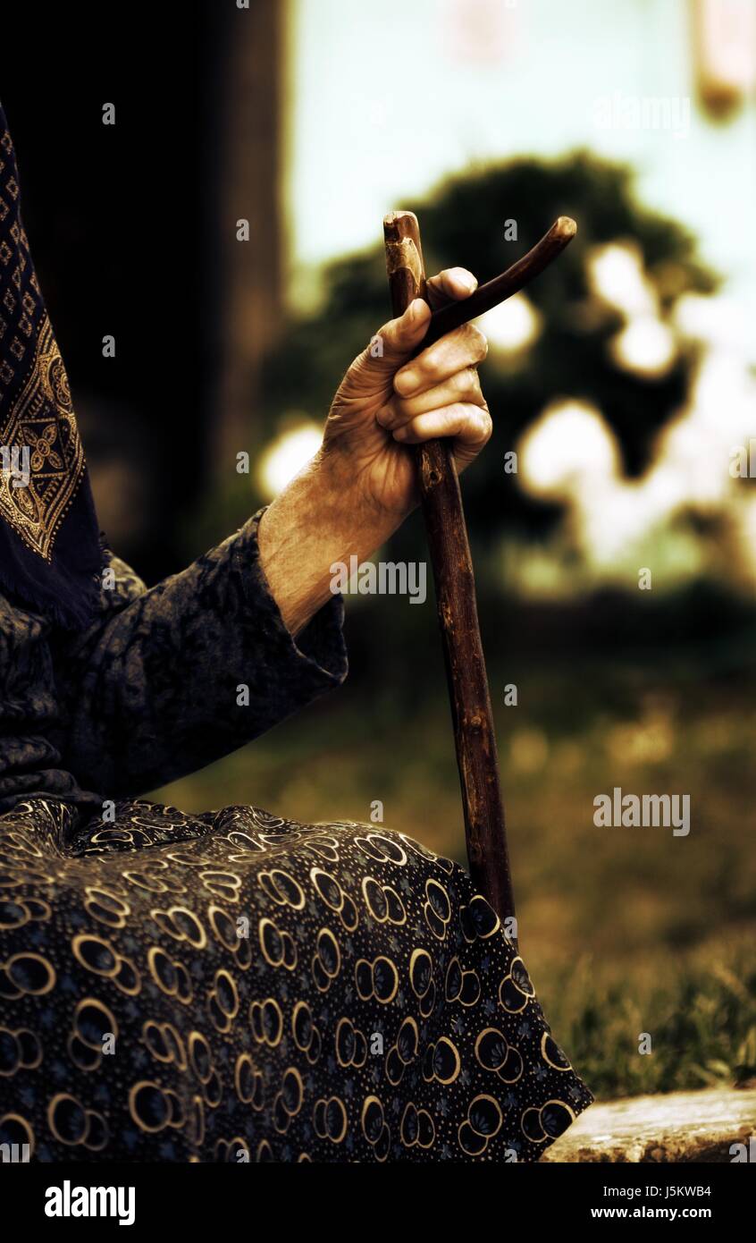 hand detail granny sits hold walkingstick put sitting sit aging emotion ...
