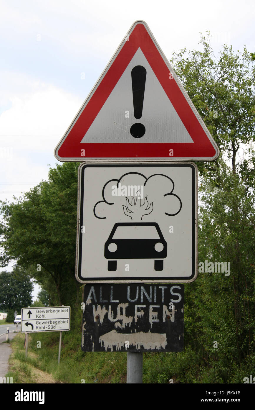 caution ... burning cars Stock Photo - Alamy