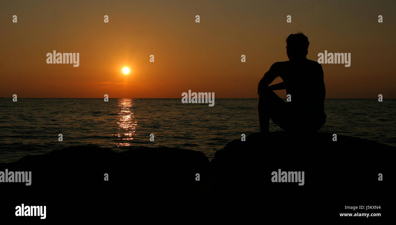 man in the sunset Stock Photo - Alamy