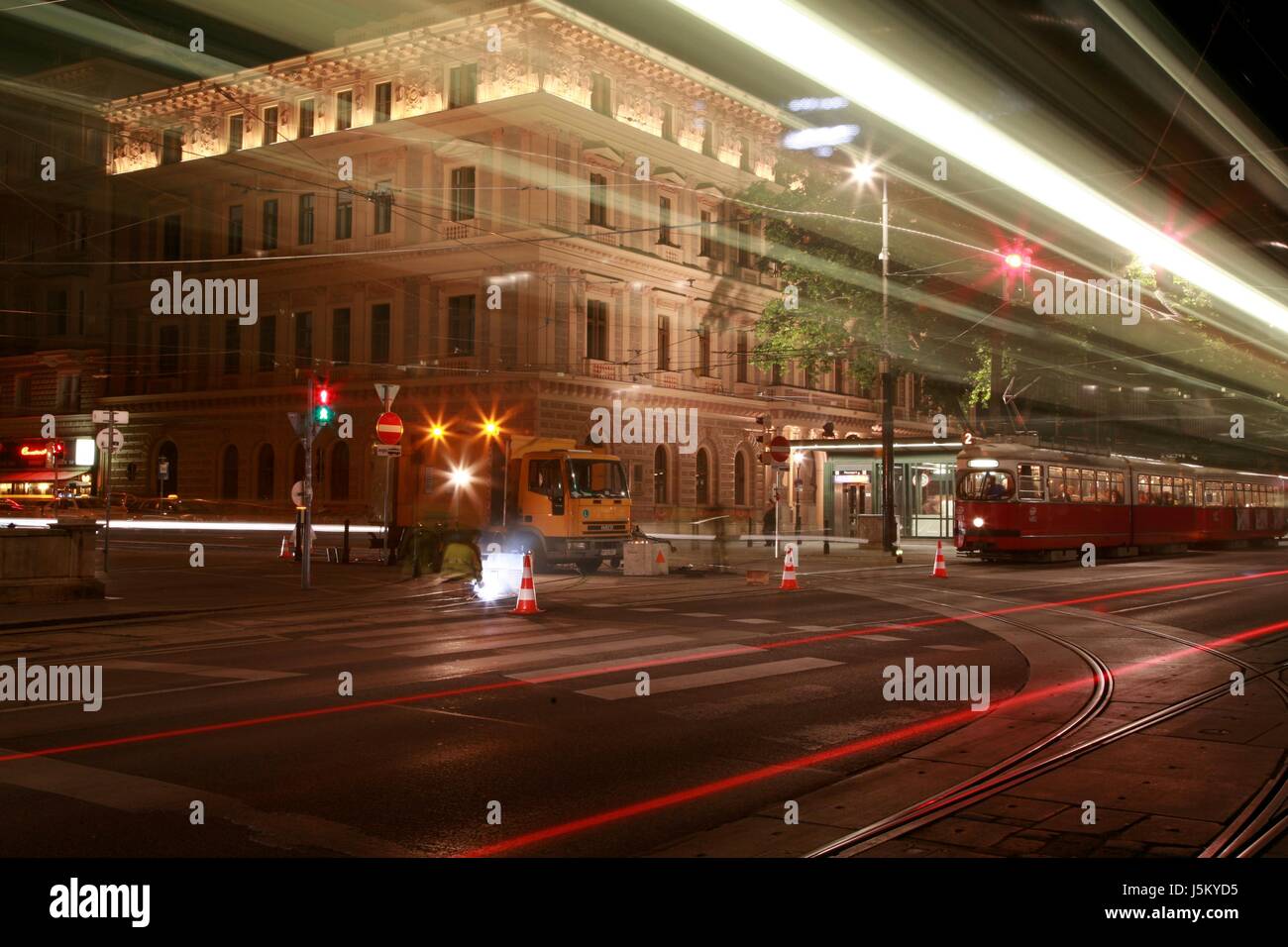 night photograph vienna tram street road cars automobiles vienna Stock ...