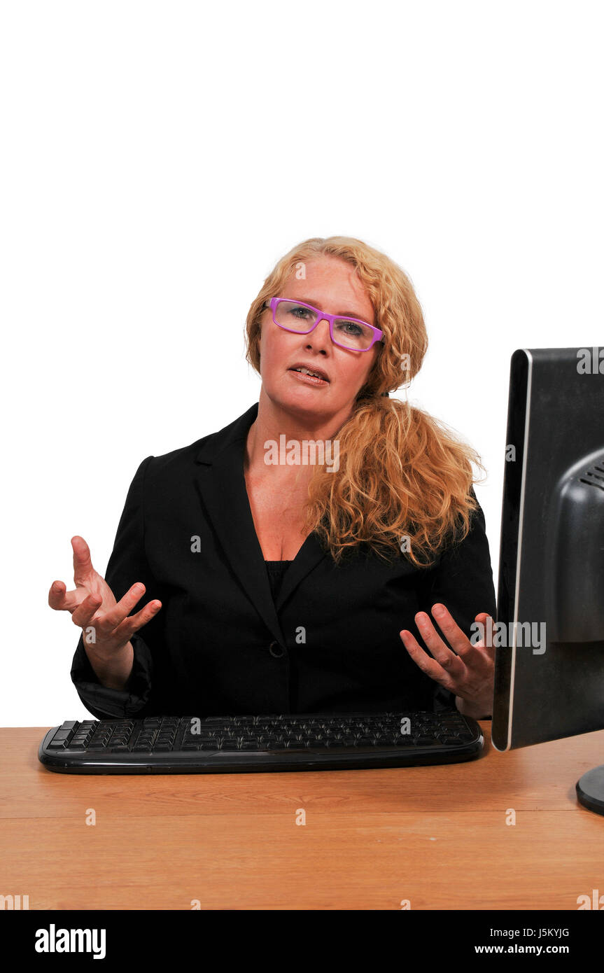 Woman executive or manager using a desktop computer Stock Photo - Alamy