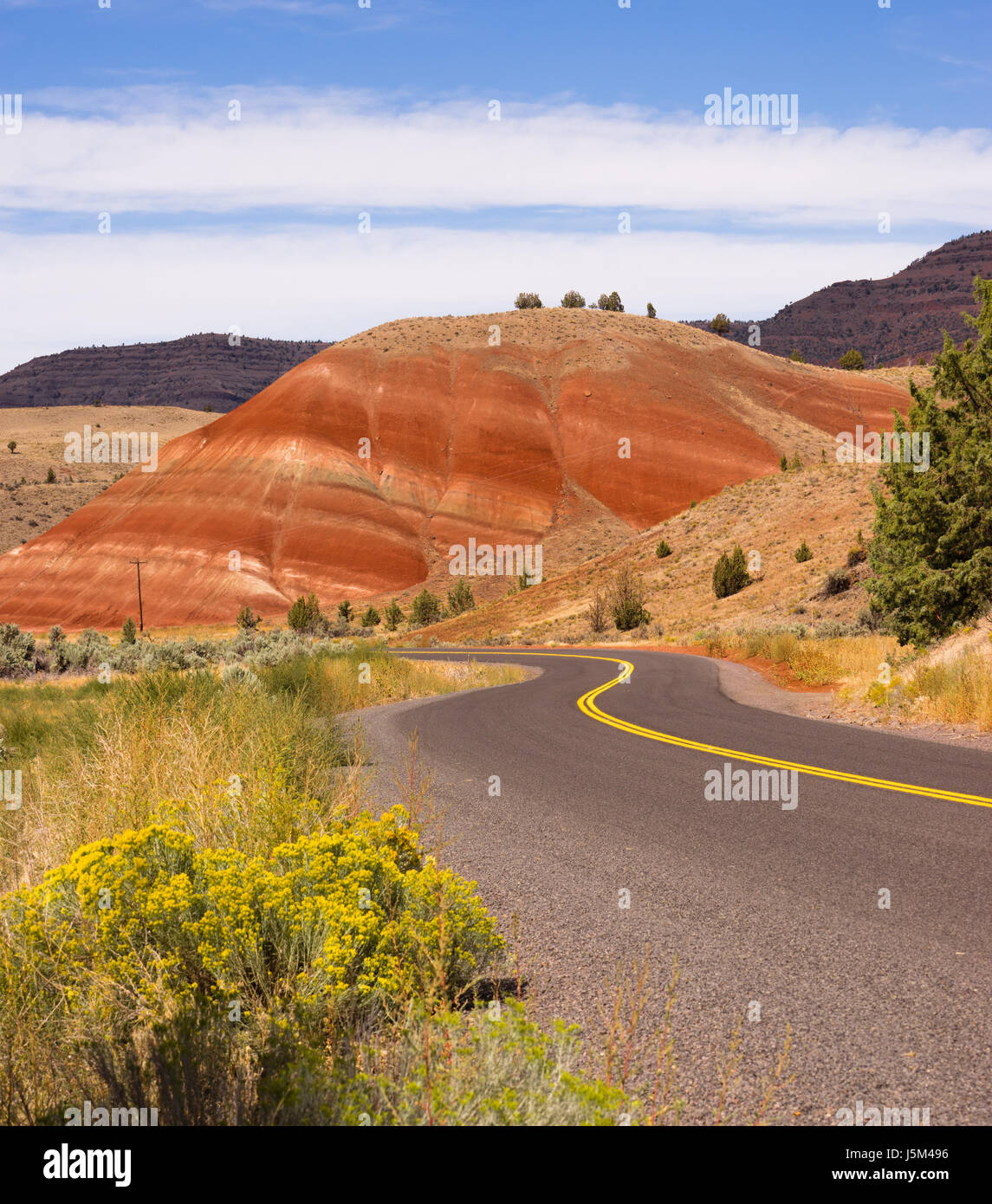 The road winds through colorful mineral and rock deposits in Oregon ...