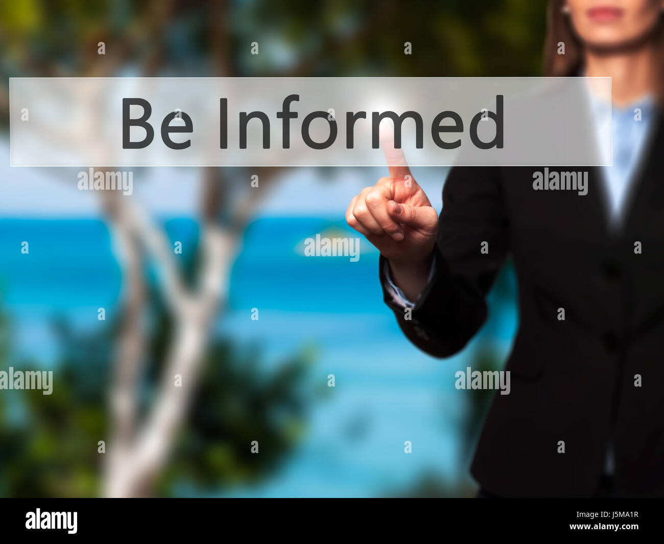 Be Informed - Businesswoman pressing modern buttons on a virtual screen ...