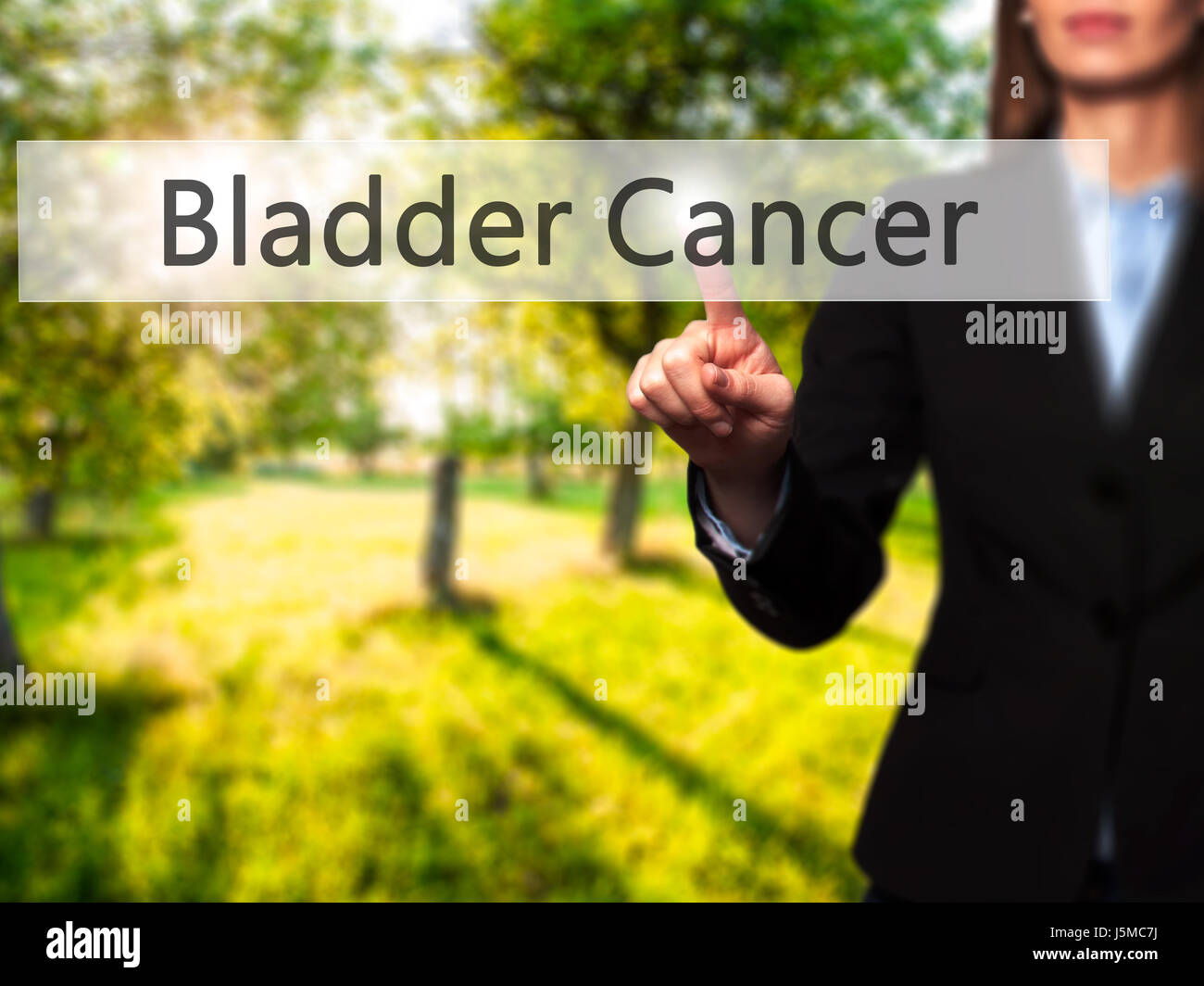 Bladder Cancer - Young girl working with virtual screen an touching ...