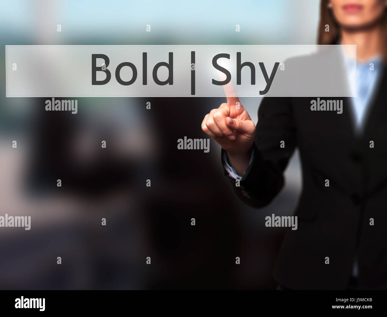 Bold Shy - Young girl working with virtual screen an touching button ...