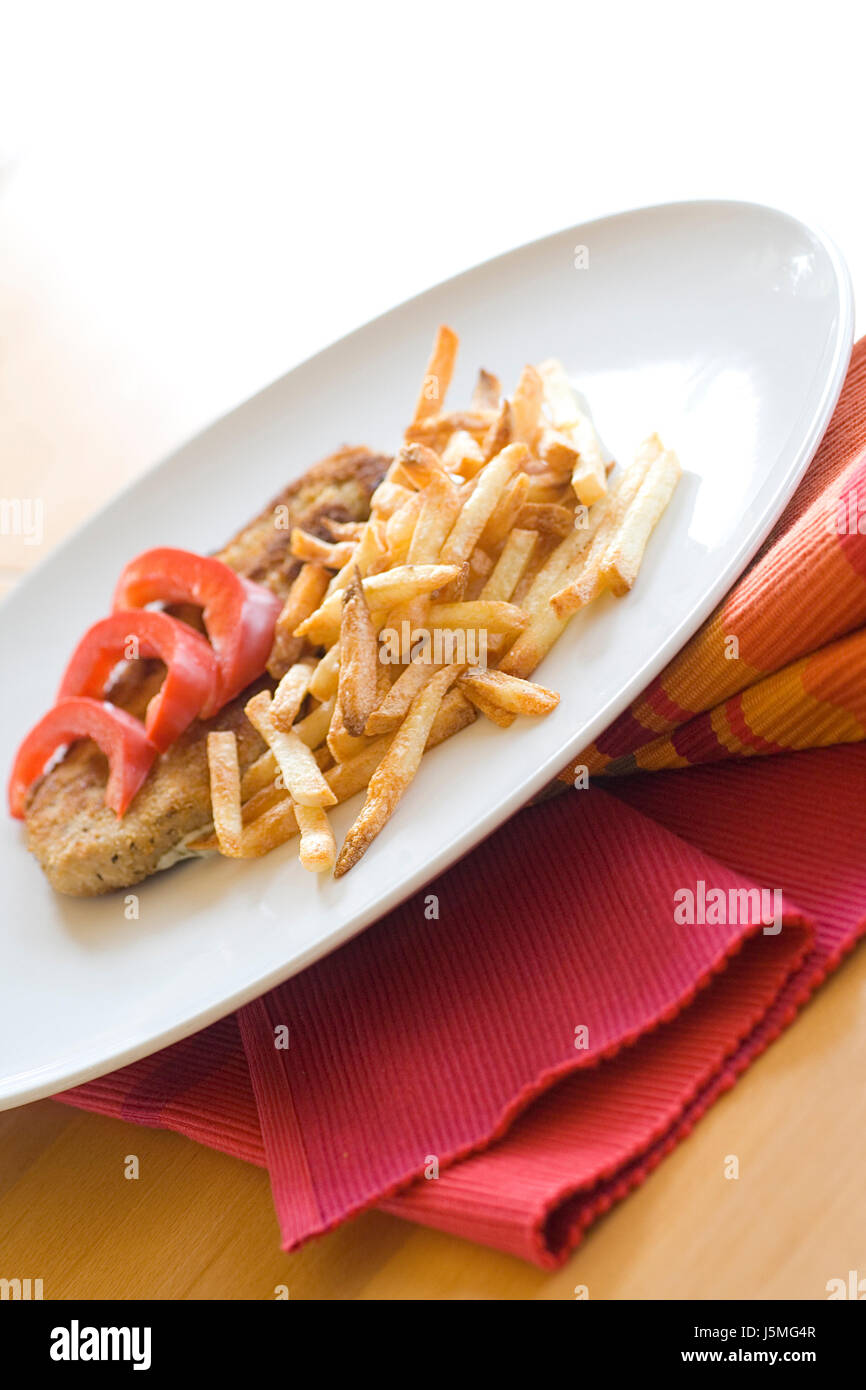 schnitzel with fries Stock Photo - Alamy
